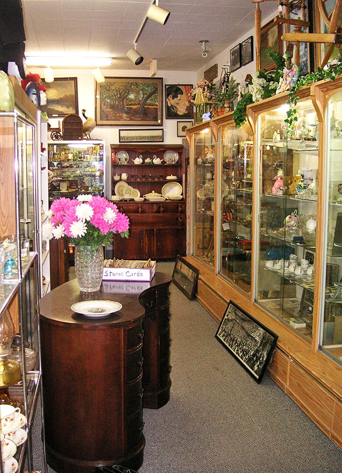 A cabinet of curiosities that would make even the most seasoned collector's heart skip a beat. Each shelf is a mini-museum of memories.