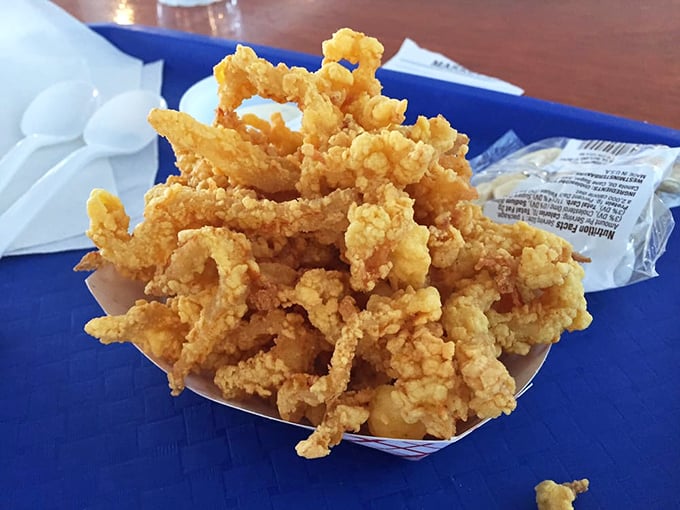 Fried clam strips: The ultimate finger food for those who like their ocean with a crispy, golden tan.