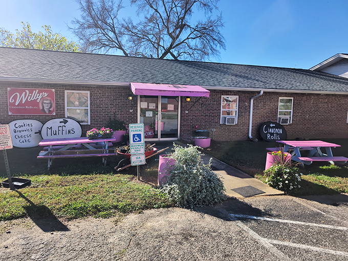 Willy's al fresco dining area: where pink picnic tables and Southern charm collide, creating the perfect spot for a sugar-fueled siesta.