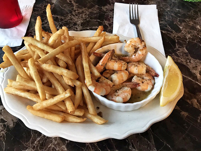 Surf meets turf on a plate. These plump shrimp and crispy fries are a match made in comfort food heaven.