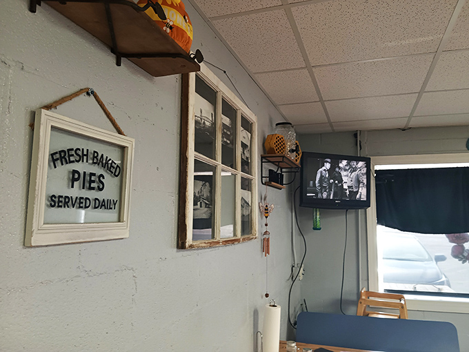 Fresh pies and classic TV? It's like they bottled up the essence of a perfect Sunday afternoon and put it on the wall.