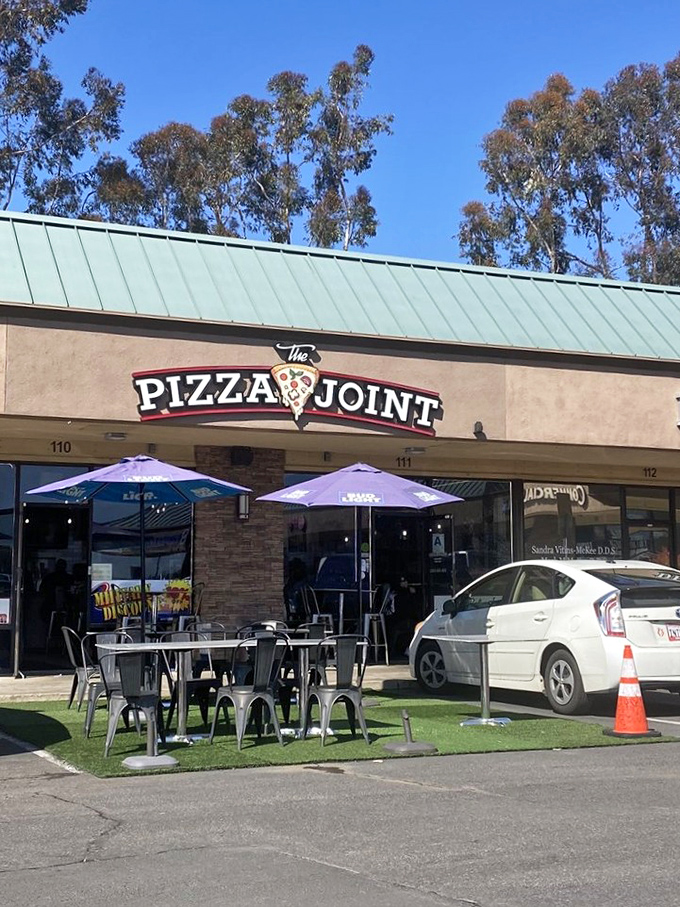 No frills, just thrills! The Pizza Joint's casual exterior hides a powerhouse of flavor &ndash; it's the Clark Kent of pizzerias.