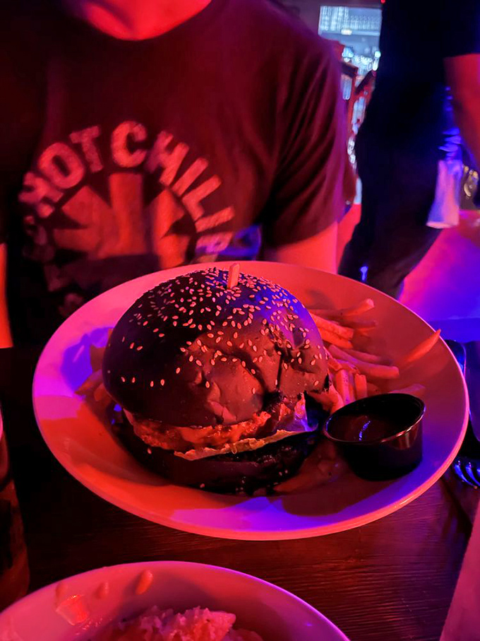 Darth Vader called &ndash; he wants his burger back! This imposing black bun creation is a force to be reckoned with. May the flavor be with you!
