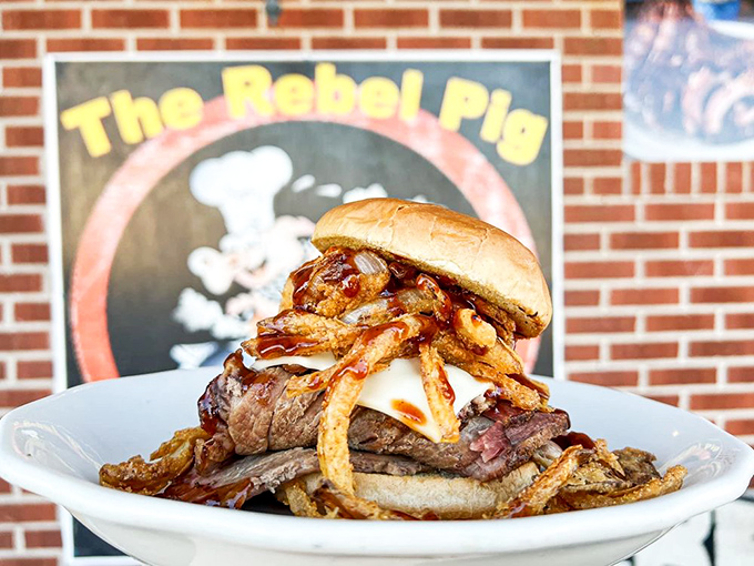Meat Jenga, anyone? This tower of brisket, cheese, and crispy onions is what food dreams are made of.