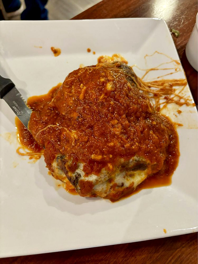 Chicken Parmesan that could make an Italian grandmother weep with joy! Golden, crispy, and smothered in sauce &ndash; bellissimo!
