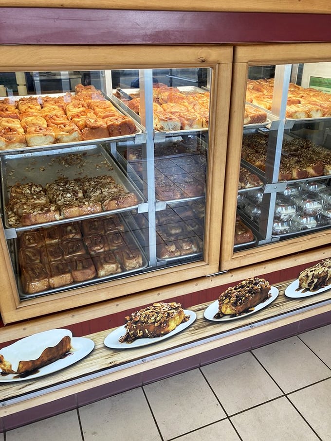 Gaze upon cinnamon roll nirvana. This display case is like a museum of deliciousness, except you're encouraged to eat the exhibits.