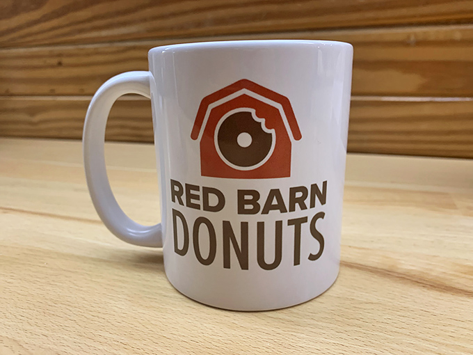 That logo mug isn't just holding coffee&mdash;it's holding the promise of becoming a regular at Arkansas' temple of fried dough.