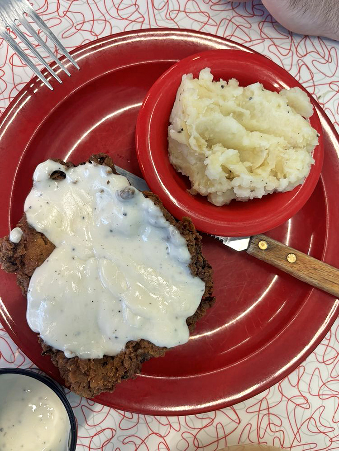 Behold, the crown jewel of Southern cuisine! This country fried chicken is crunchier than your old mixtapes and twice as satisfying.