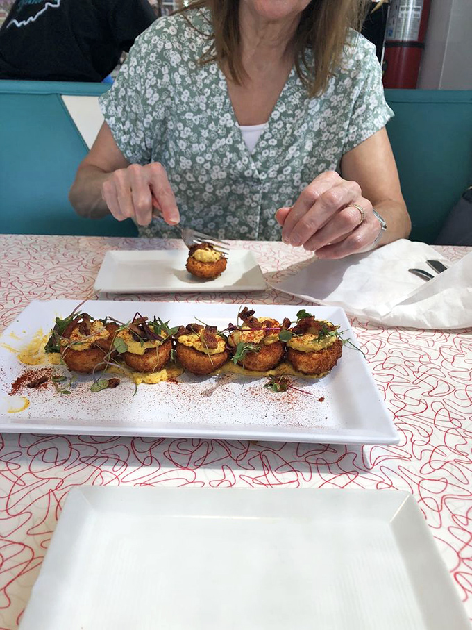 Deviled eggs leveled up! These crispy bites are what happens when comfort food goes to finishing school.