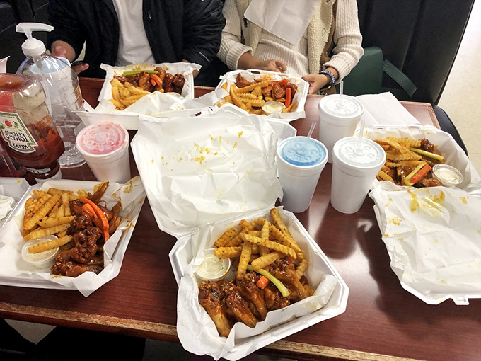 A table full of wing baskets is Memphis' version of a family-style feast. Sharing optional but highly recommended.