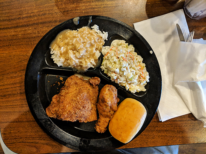 Fried chicken that's crunchier than your granddad's knees at a square dance. Southern-fried perfection on a plate!