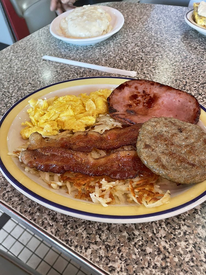 Brace yourself for the Lumberjack Breakfast! This plate has more meat than a bodybuilding competition. It's not just a meal, it's a challenge &ndash; and we're here for it.
