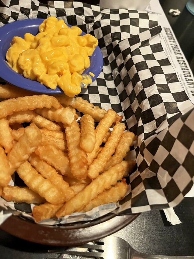 Mac 'n' cheese so vibrant, it could guide ships to shore! Creamy, dreamy, and cheesier than a dad joke convention.