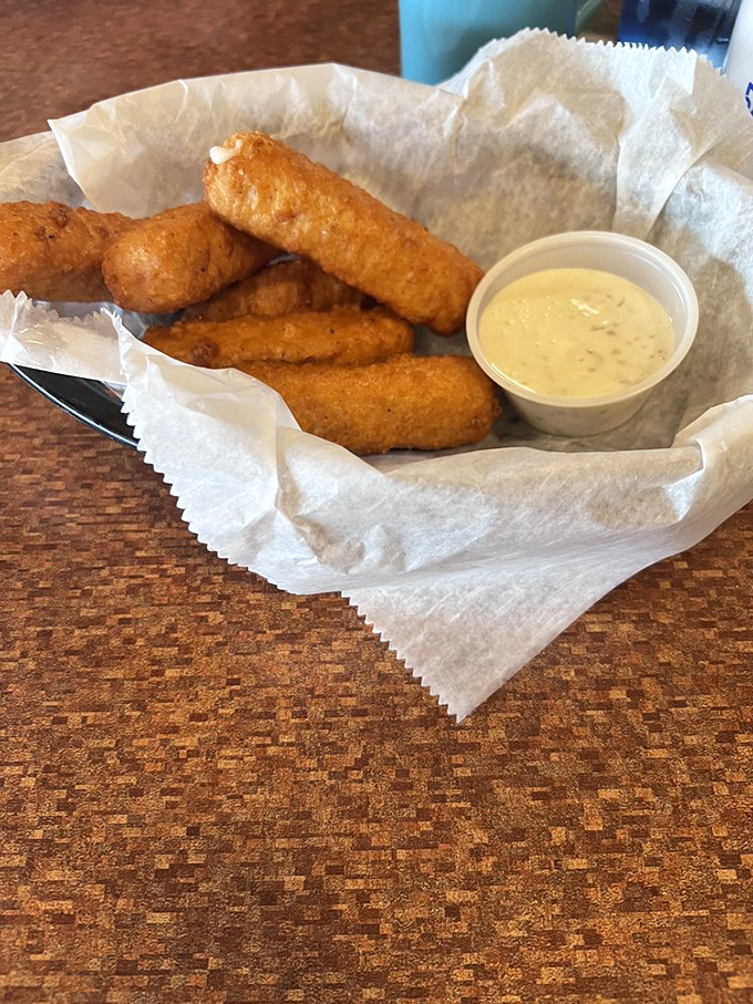 Cheese pulls for days! These golden-brown mozzarella sticks are stretching the definition of breakfast food, and we're here for it.