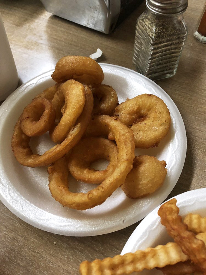 Crispy, golden, and utterly irresistible. These onion rings are like edible halos, sent straight from burger heaven. Angelic deliciousness, anyone?