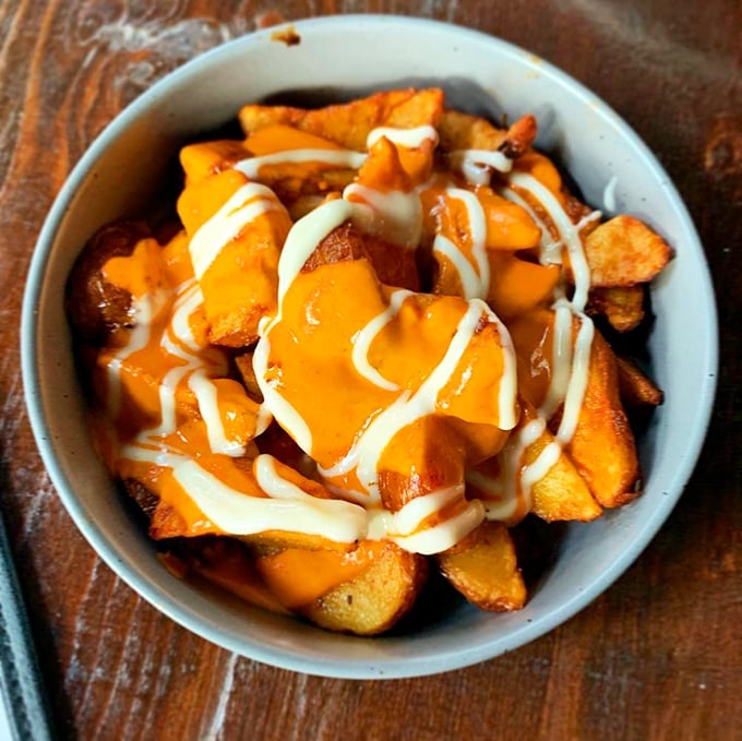 These patatas bravas aren't just potatoes; they're spuds that went to Europe for a semester abroad and came back transformed.