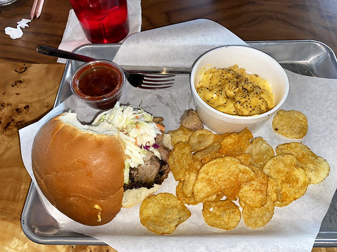 Pulled pork perfection: A sandwich so stuffed with juicy meat, it's like a hug for your hunger.