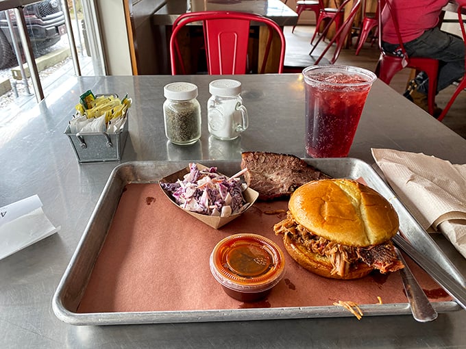 A pulled pork sandwich that's more stacked than your grandpa's vinyl collection. Each bite is a trip down flavor lane.