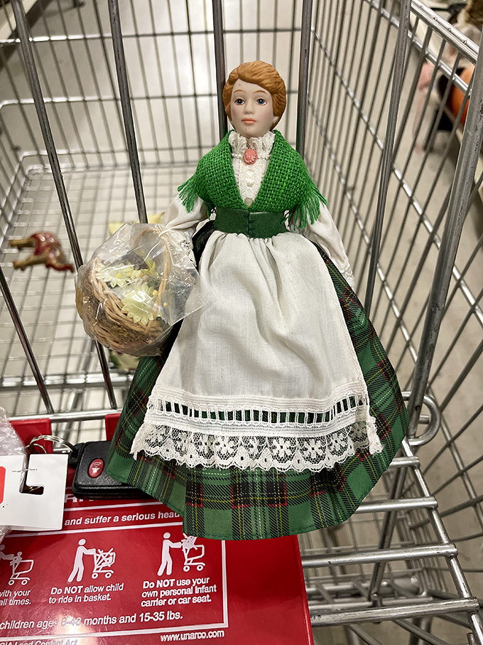 Is it a long-lost heirloom or someone's craft project gone awry? Either way, this doll is serving "Little House on the Prairie" realness.
