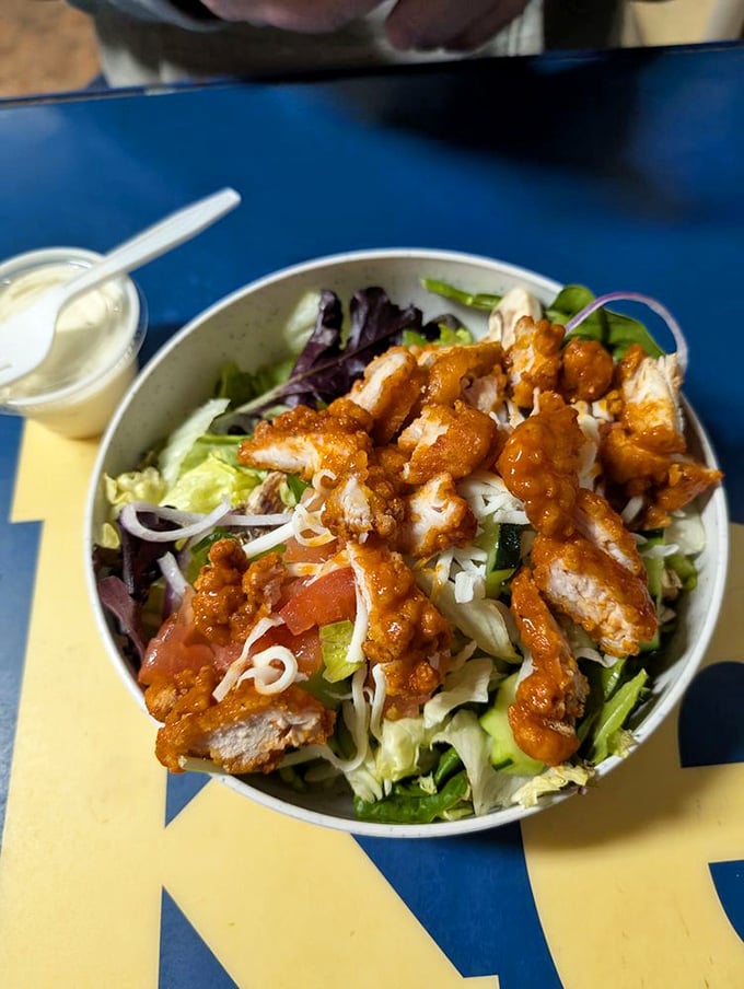 Crispy chicken fiesta! This salad's got more kick than a line dance at a country western bar.