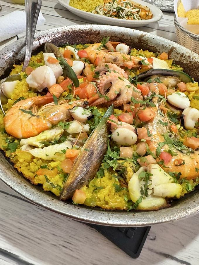 Paella party in a pan! This colorful medley is what seafood dreams are made of.