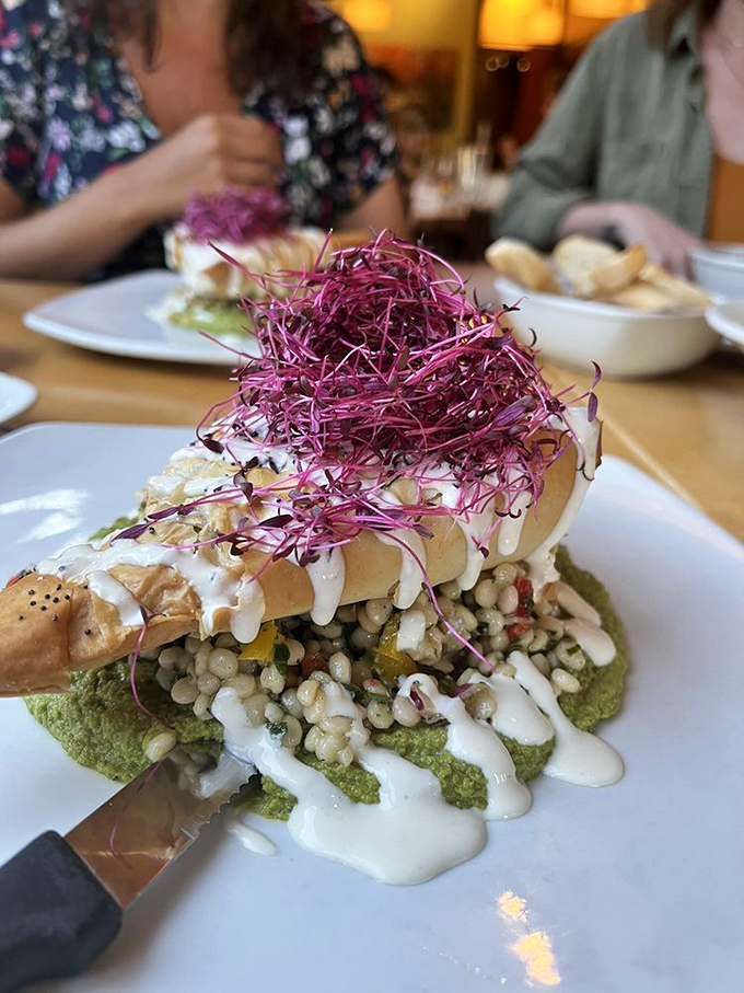A tower of plant-powered deliciousness topped with microgreens so vibrant they're practically showing off.