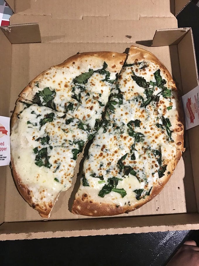 Spinach Alfredo to-go: Proof that even takeout can be gourmet. Popeye would trade his can of spinach for this leafy, cheesy delight.