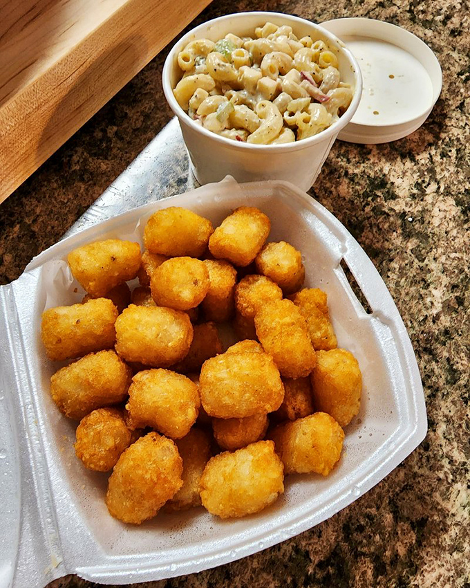 Golden tater tots that crunch like your childhood memories, paired with mac salad that's creamy enough to make you forget your troubles.