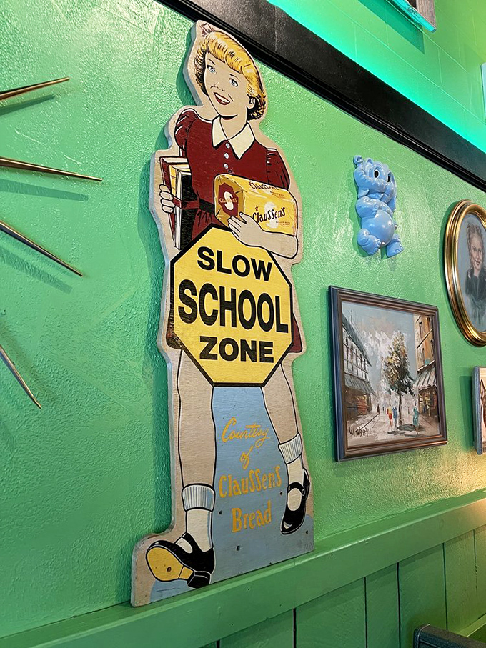 A feast for the eyes! This eclectic wall decor is like a scavenger hunt for pop culture enthusiasts.