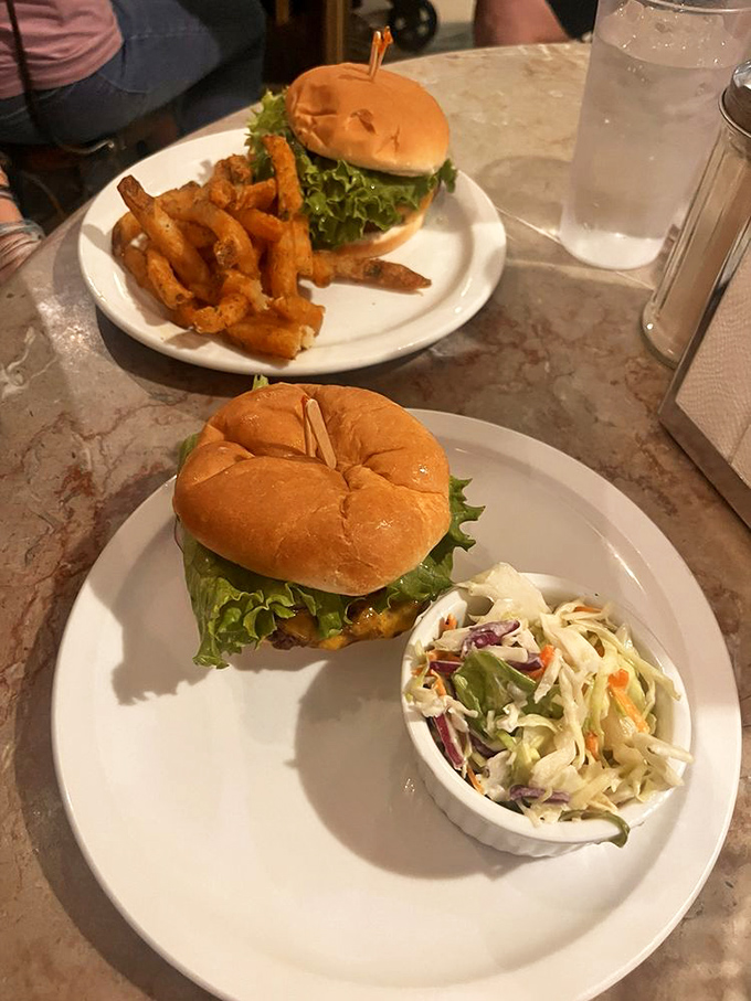 Burger bliss times two! These juicy patties nestled in pillowy buns are proof that sometimes, the simple things in life are the most satisfying. Double the deliciousness!