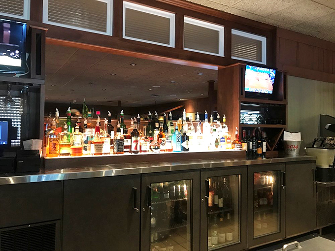Shaken, stirred, and spectacular: The bar area is stocked and ready to quench your thirst. Captain Jack Sparrow would approve of this rum selection!