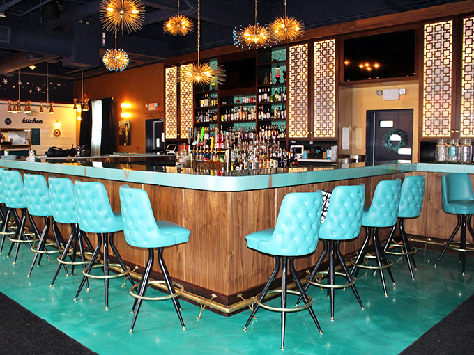 Pull up a turquoise chair and stay awhile! This retro-fabulous bar is where "Cheers" meets "The Jetsons."