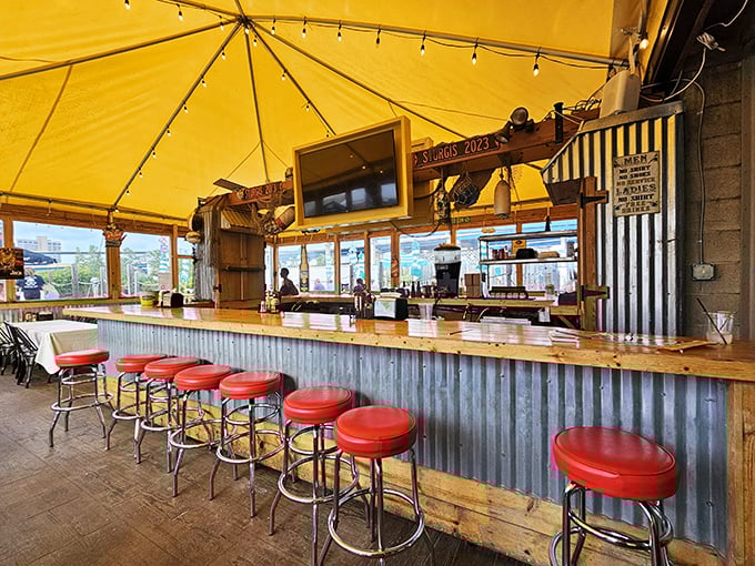 Bar goals: achieved. With its wooden charm and corrugated metal accents, this spot is where "rustic chic" meets "let's have another round."