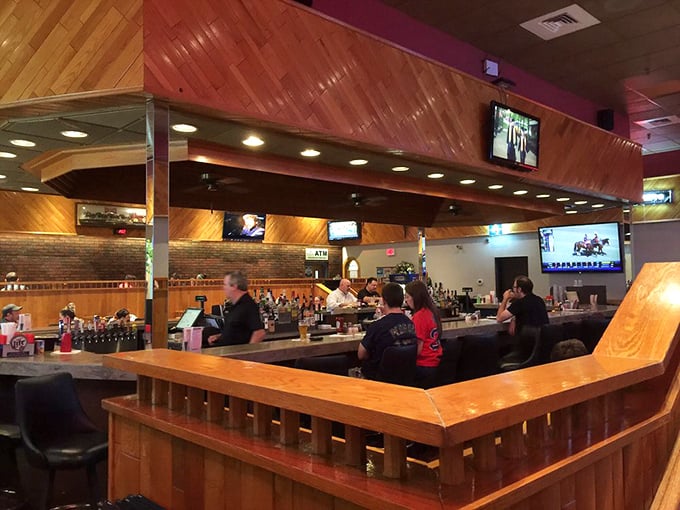 Pull up a stool and stay awhile. This bar area is where pizza legends are born and diet resolutions go to die.