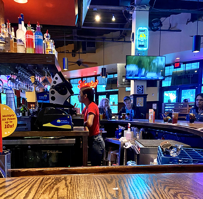 At this bar, the spirits are high and the TVs are always on. It's where "bottoms up" meets "game on!"