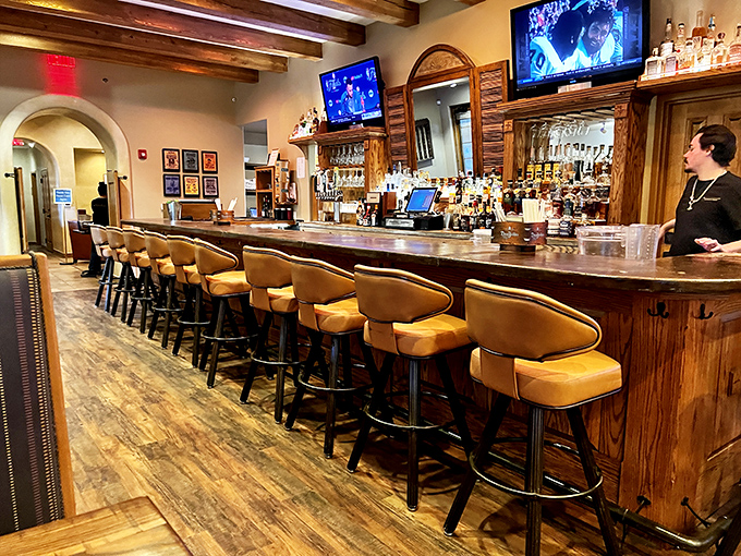 Pull up a seat at the bar and prepare for some liquid therapy. With a setup like this, you'll be solving the world's problems in no time.