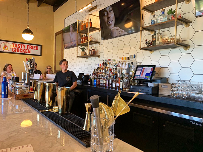 A bar stocked for serious business. Those bartenders aren't just mixing drinks&mdash;they're creating the perfect wing accompaniment.