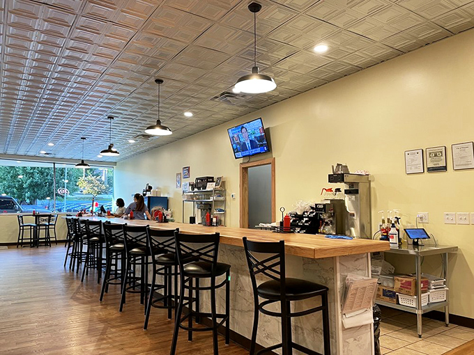Counter seating that invites solo diners, coffee philosophers, and those who appreciate the theater of short-order cooking in its natural habitat.