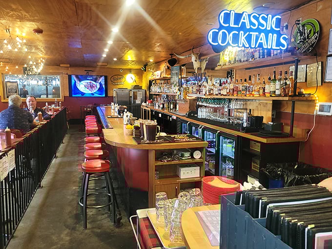 The bar area beckons with the promise of craft beverages that understand their supporting role in the barbecue experience.