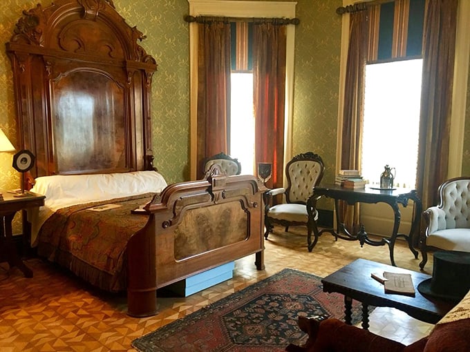 A bedroom fit for a Southern belle or a visiting dignitary. The hardest part would be deciding which chair to read your novel in.