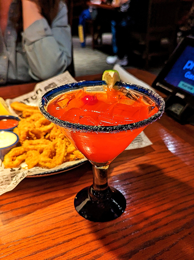 A sunset in a glass! This cocktail is more photogenic than your average Instagram influencer.