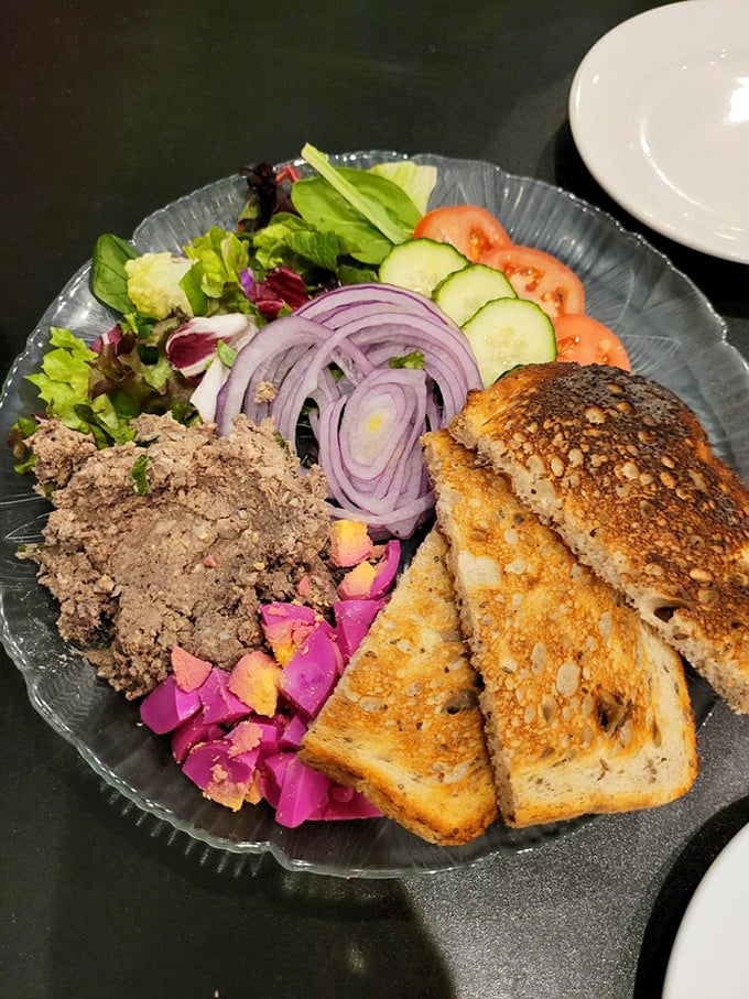 Chicken liver plate: the ultimate test of a deli's mettle. Perly's version with pickled beets and red onion is a masterclass in balance.