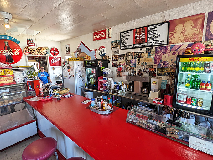 This isn't just a counter, it's a stage where donut dreams come true. And those red stools? Front row seats to the tastiest show in town!