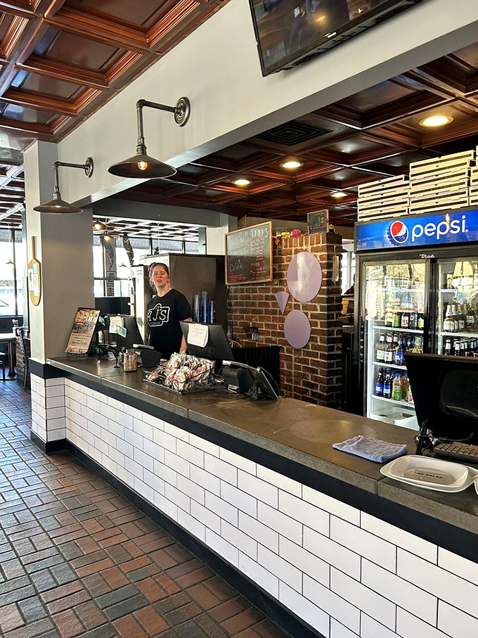 At the counter, where pizza dreams come true! Watch in awe as your slice is reheated to crispy, gooey perfection.