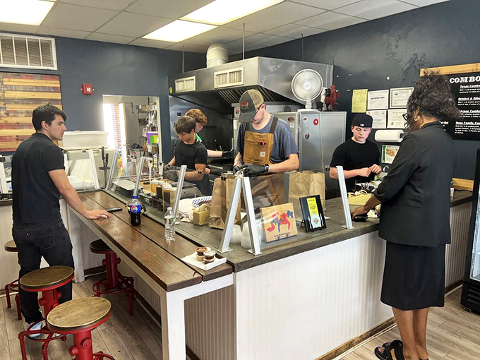 Service with a smile (and a side of sauce). These folks are the unsung heroes of your BBQ experience.