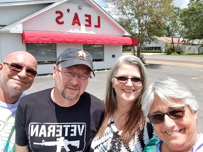 Happiness is contagious! These satisfied customers are living proof that good food brings people together.