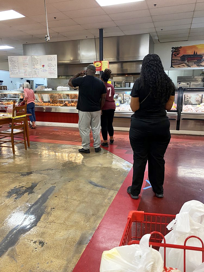 The universal language of anticipation: customers patiently waiting their turn for homemade delights that can't be rushed or replicated.