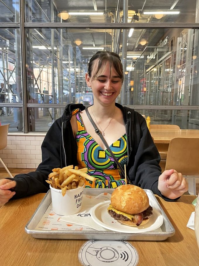 The universal expression of burger bliss. Nothing says "I made the right choice" quite like this look of pure contentment.