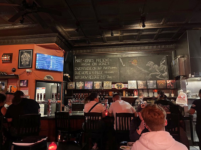 Where burger dreams come true! Diners eagerly await their metal-inspired meals in Kuma's cozy, energetic atmosphere.