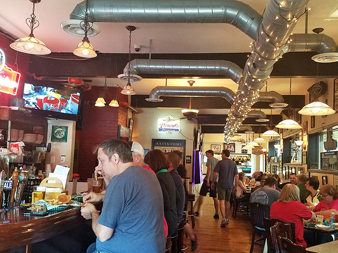 Where strangers become friends over shared love of burgers. The Nook: part eatery, part social experiment in cheese-induced bonding.